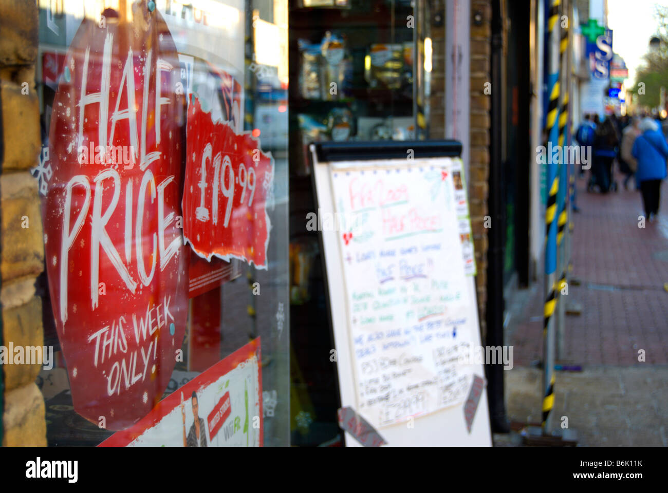 shop window signs advertising a half price sale, in hounslow high ...