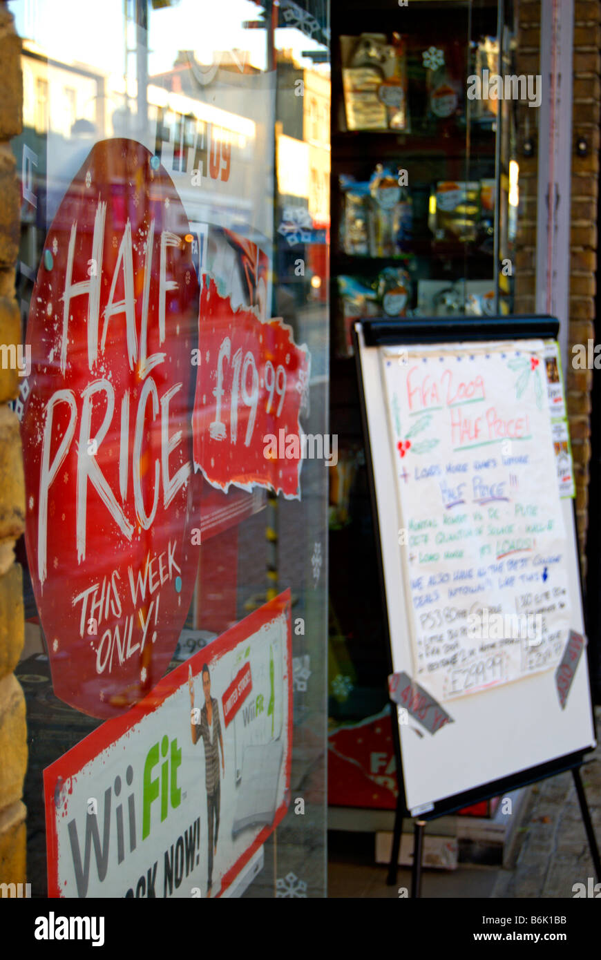 shop window signs advertising a half price sale, in hounslow high ...