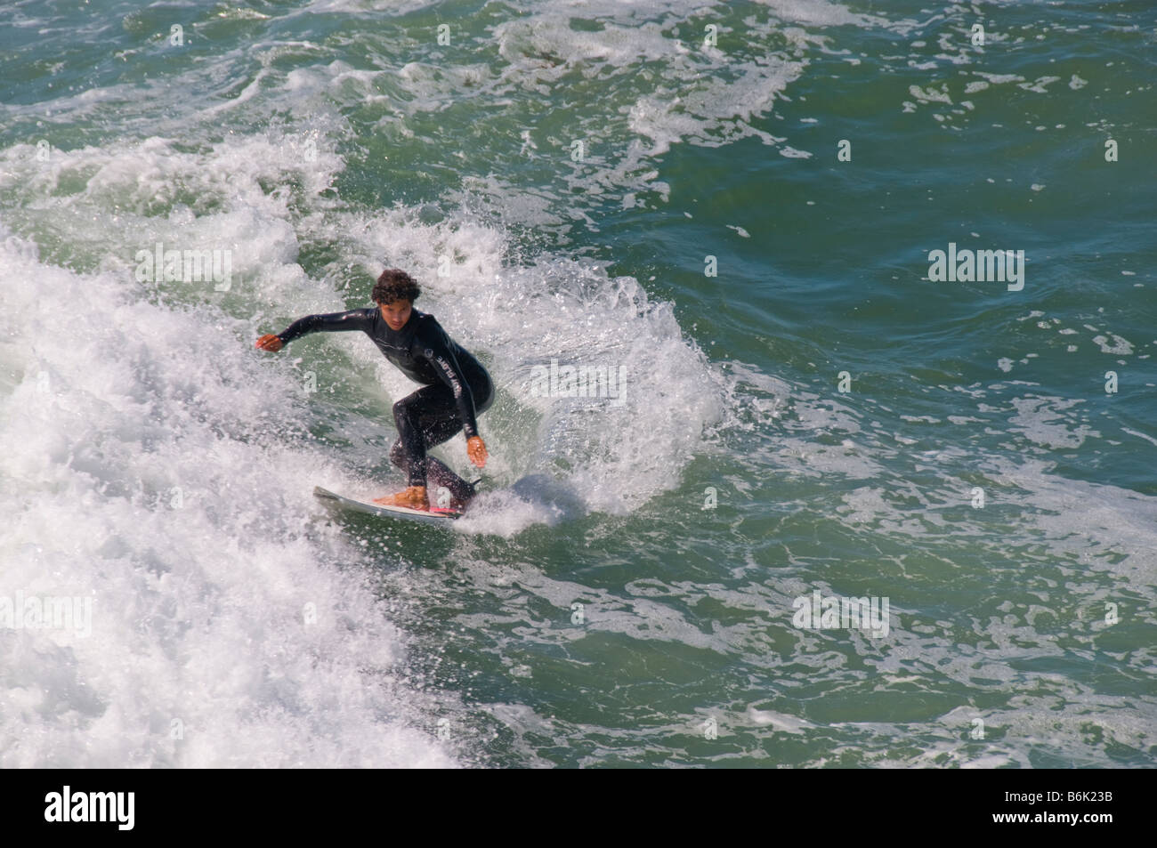 Boy surfing teen wetsuit hi-res stock photography and images - Alamy
