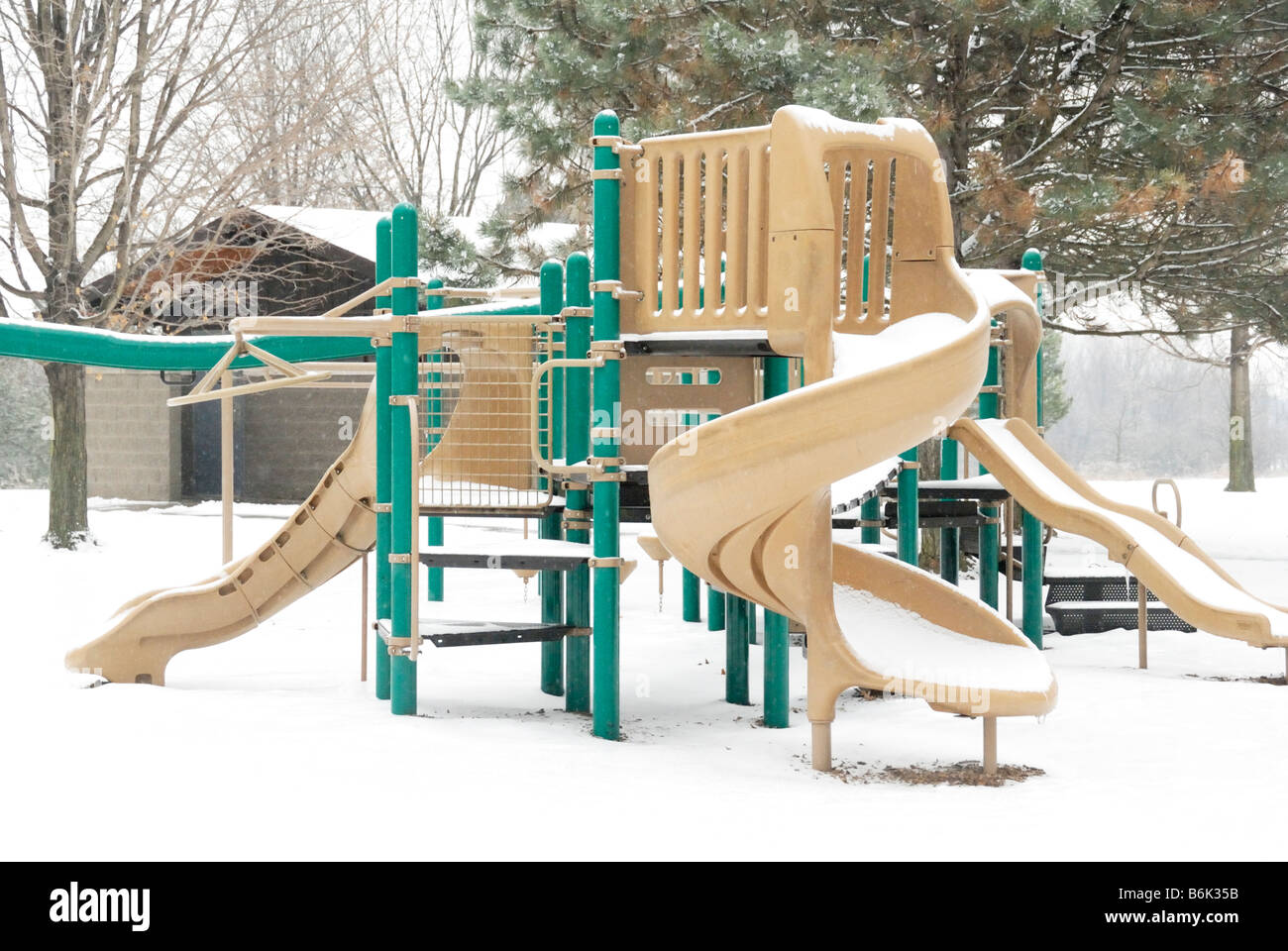 Frozen playground equipment Stock Photo - Alamy