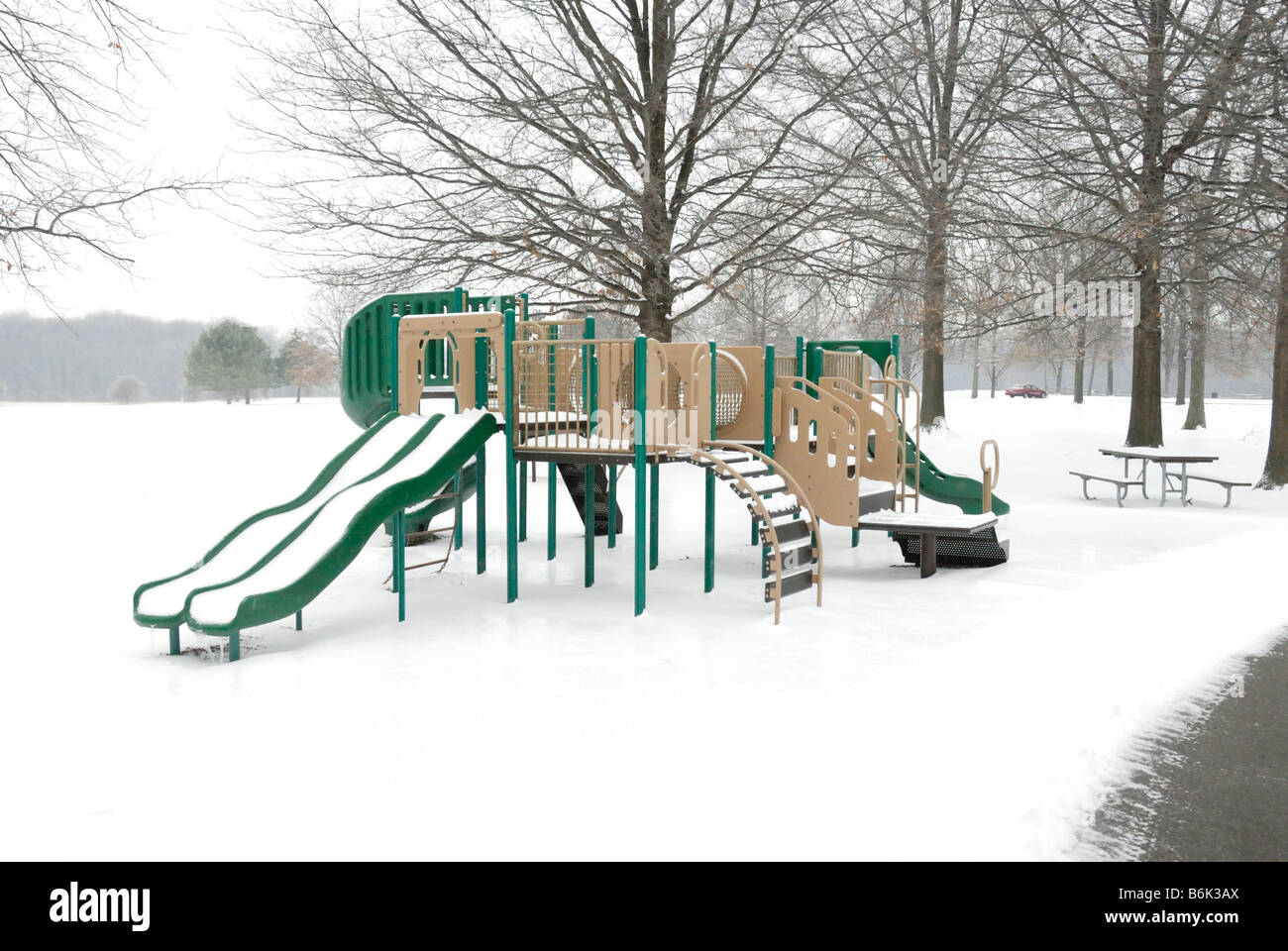Frozen playground equipment Stock Photo - Alamy