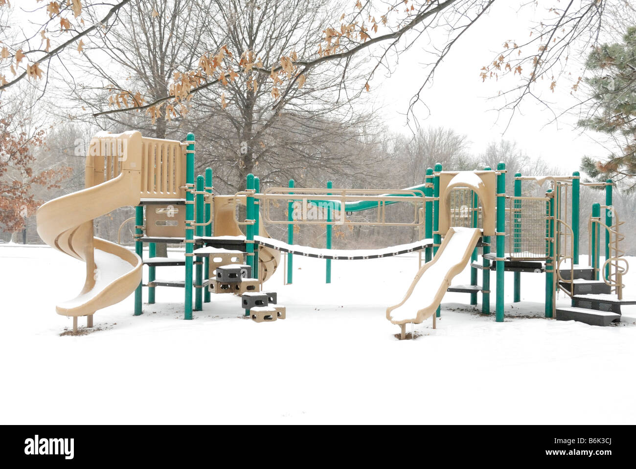 Frozen playground equipment Stock Photo - Alamy