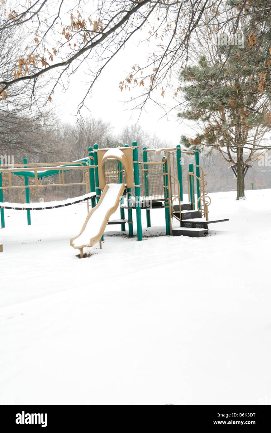 Frozen playground equipment Stock Photo - Alamy