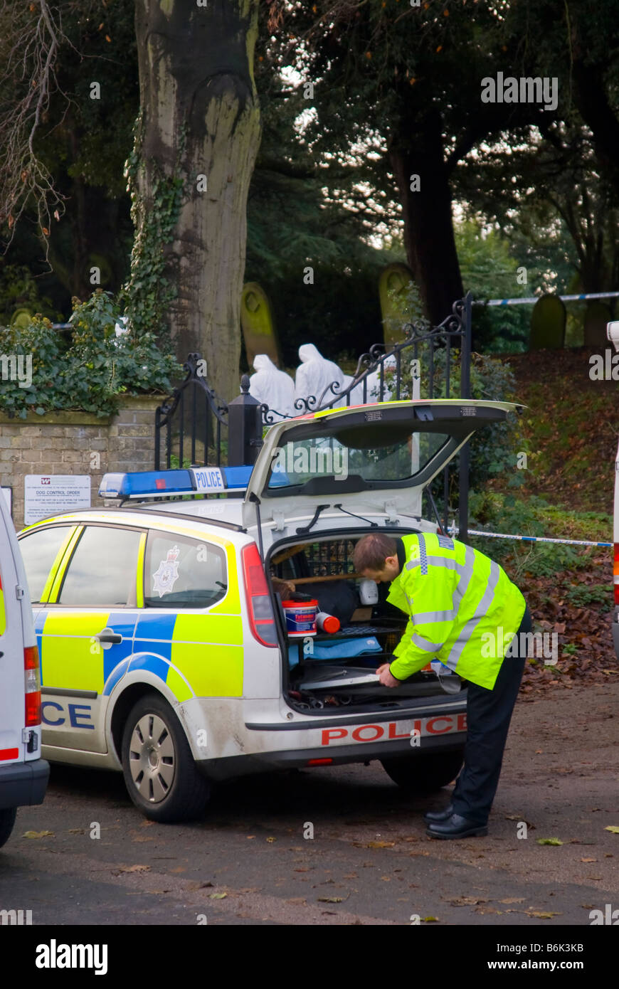 Police and forensic officers searching for clues after a crime has been ...