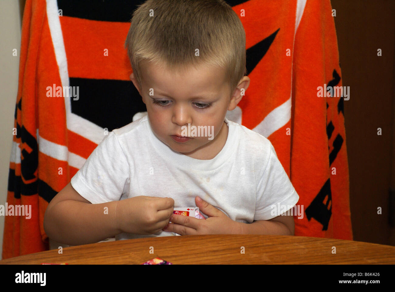 Child play cards hi-res stock photography and images - Alamy