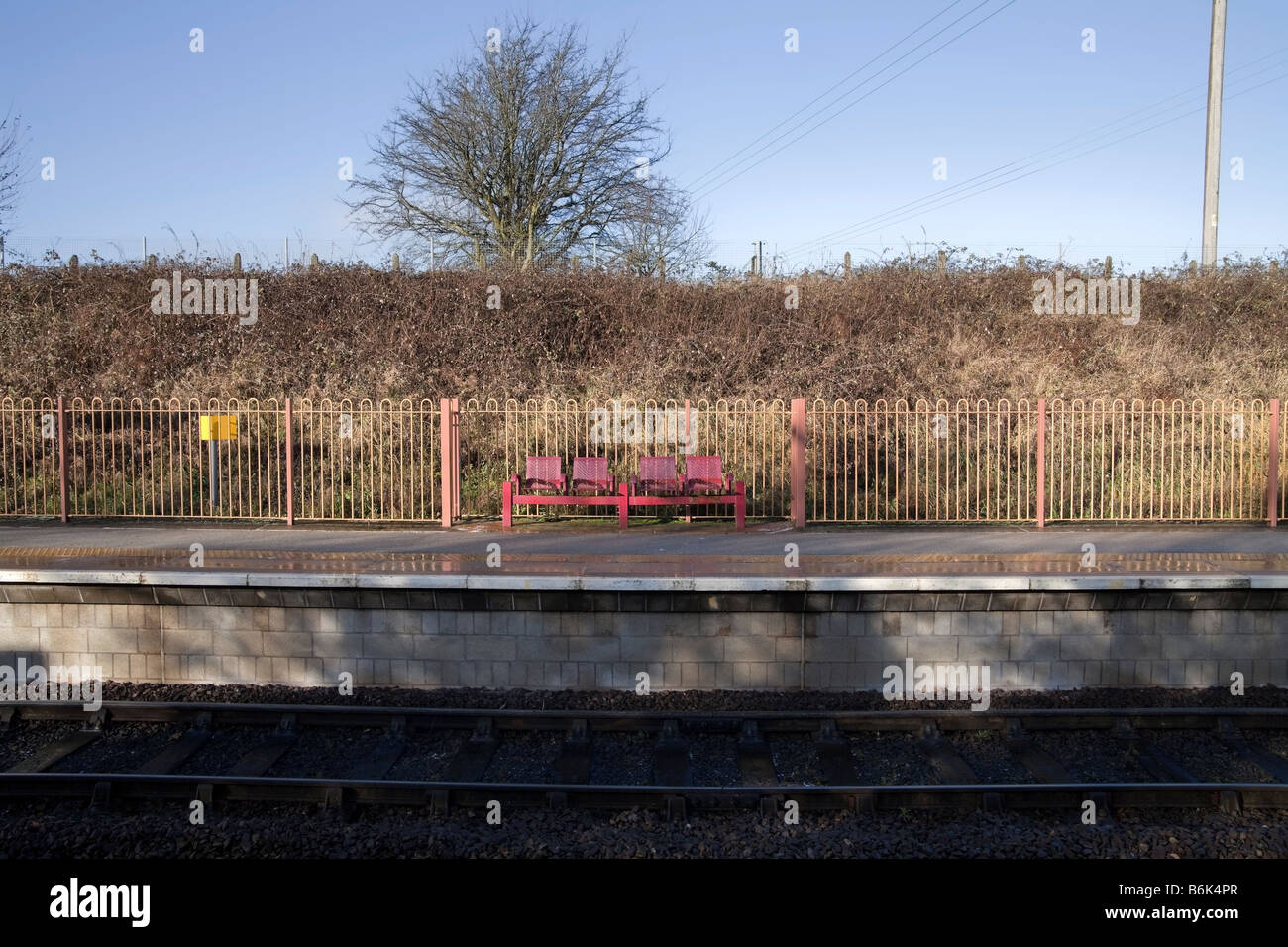 A station on a railway line in the countryside Stock Photo - Alamy