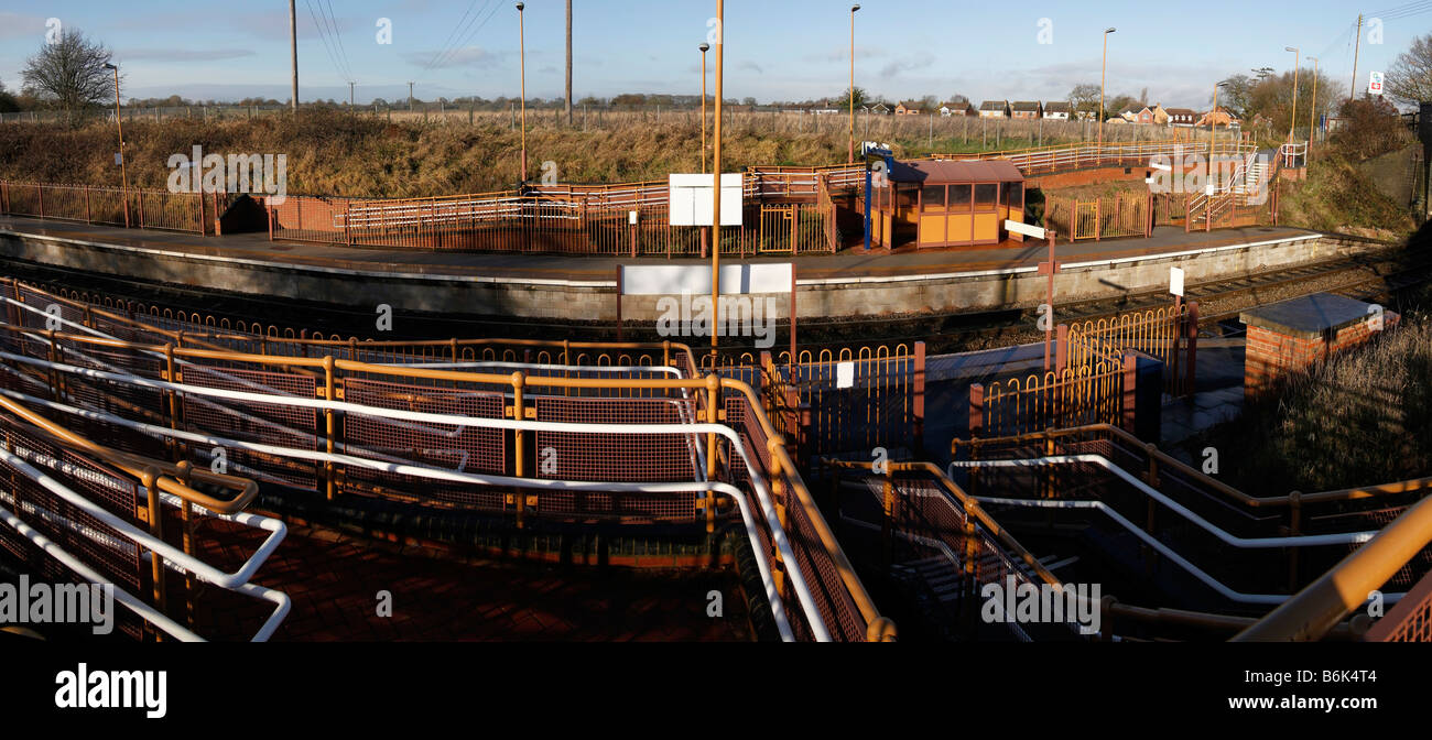 A station on a railway line in the countryside Stock Photo - Alamy