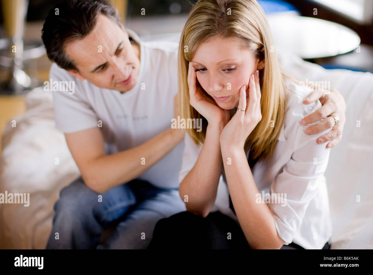 Father consoling daughter Stock Photo - Alamy