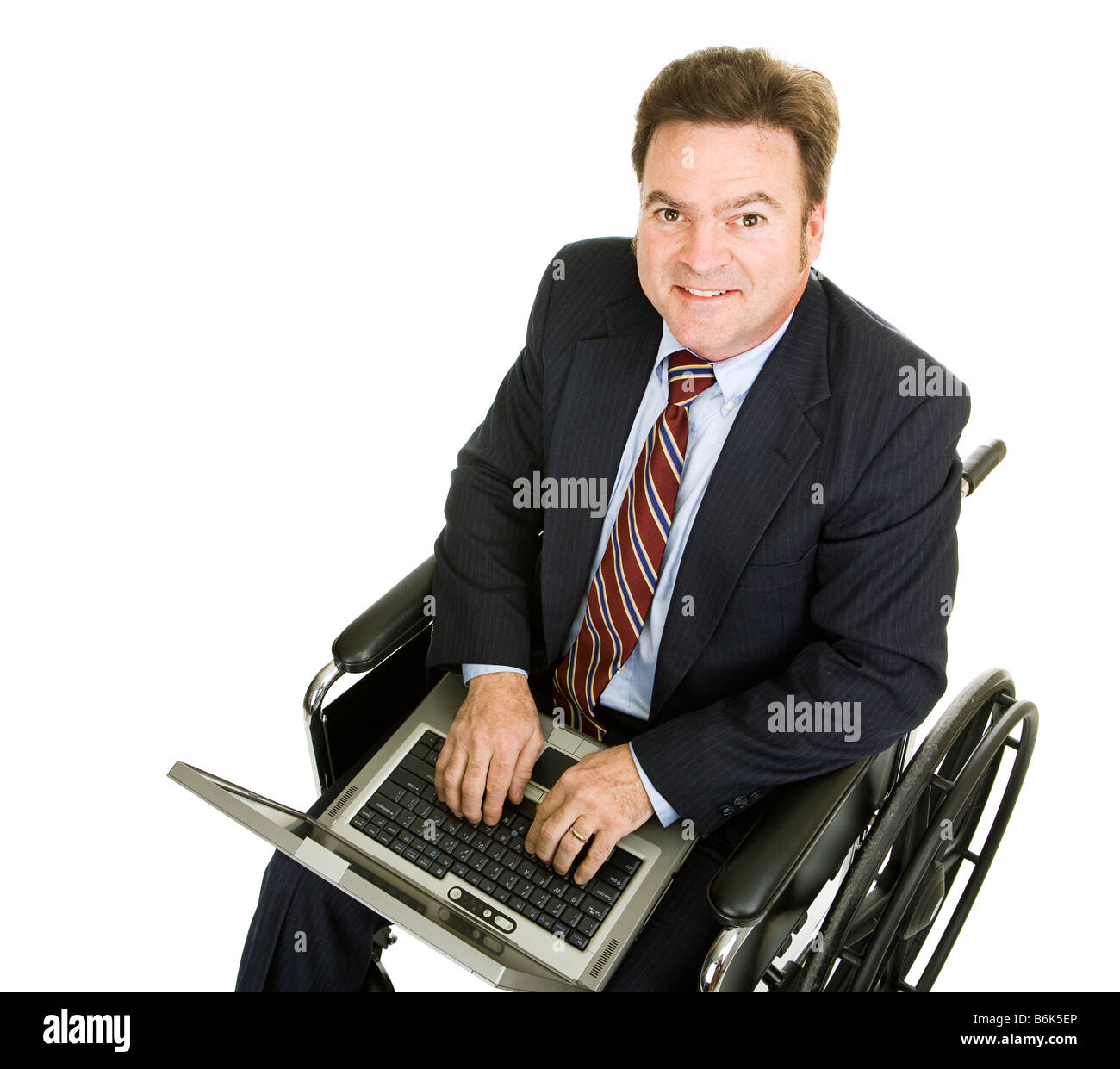 Disabled businessman typing on his laptop computer Isolated on white Stock Photo - Alamy