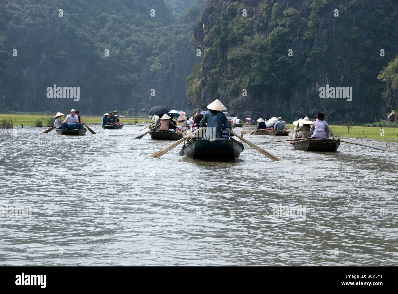 Tam Coc (Three Caves) on the Ngo Dong River, north Vietnam A boat ride ...