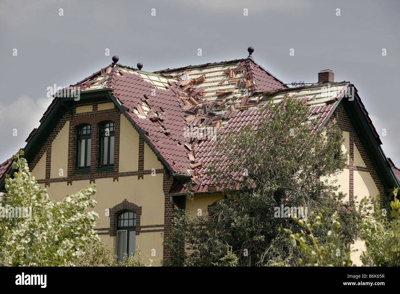 damaged roof by storm Stock Photo - Alamy