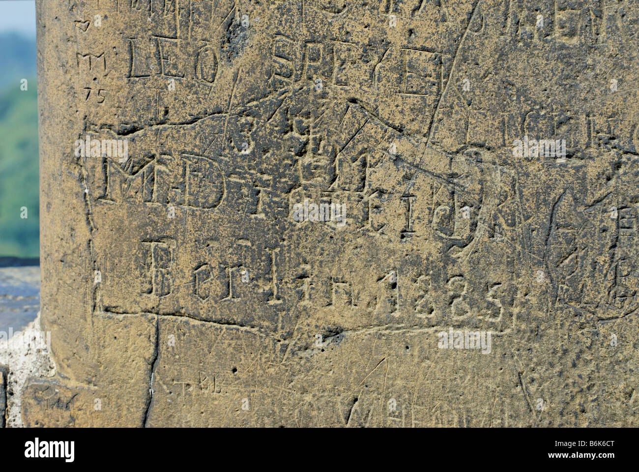 Old carved inscriptions on the stone of the viewing platform in the ...