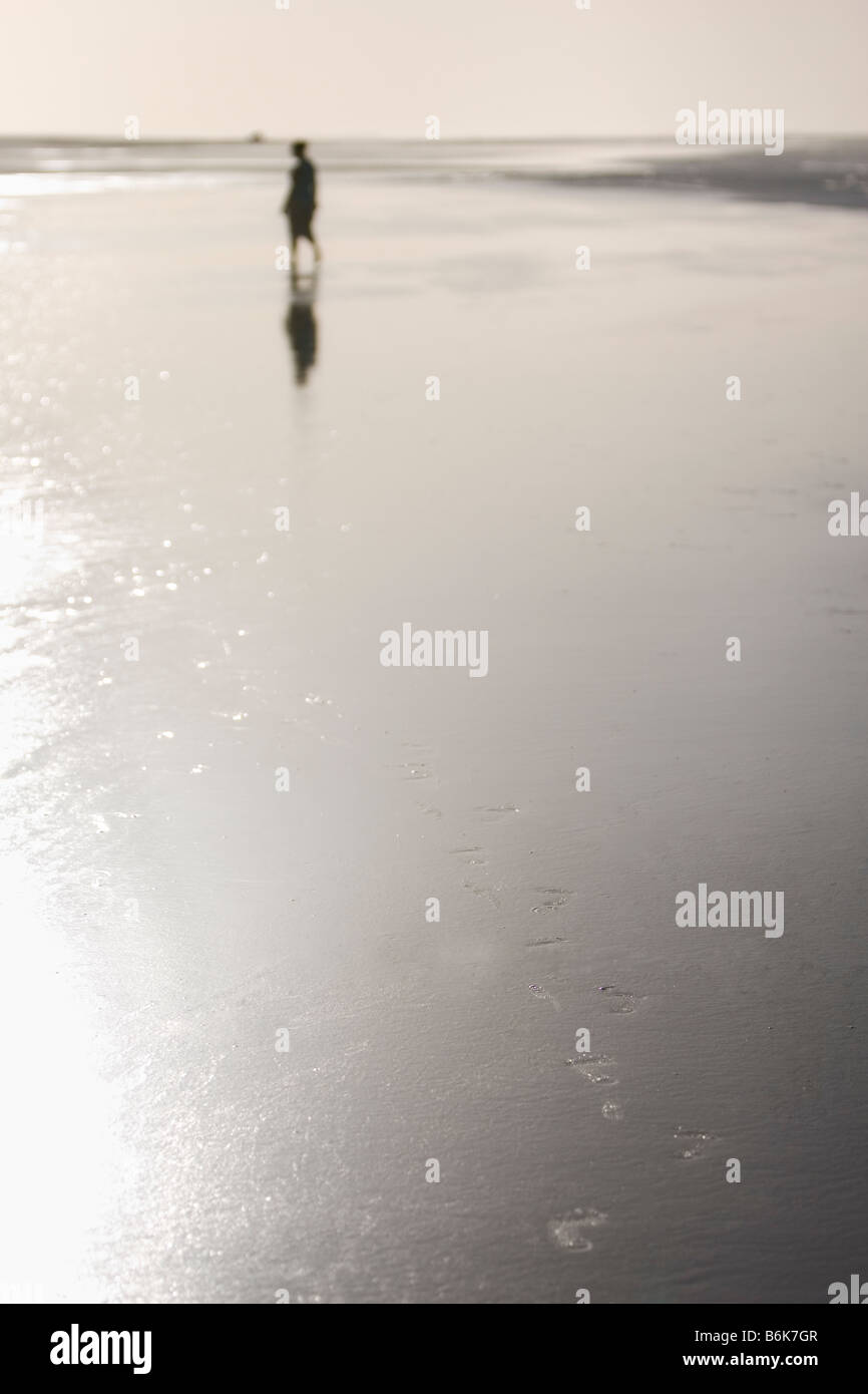 woman walking on shallow water Stock Photo - Alamy