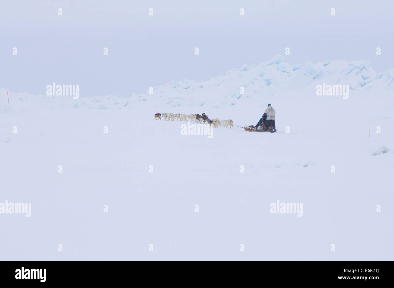 Inupiaq subsistence hunter reopens a hole in the pack ice for potential ...