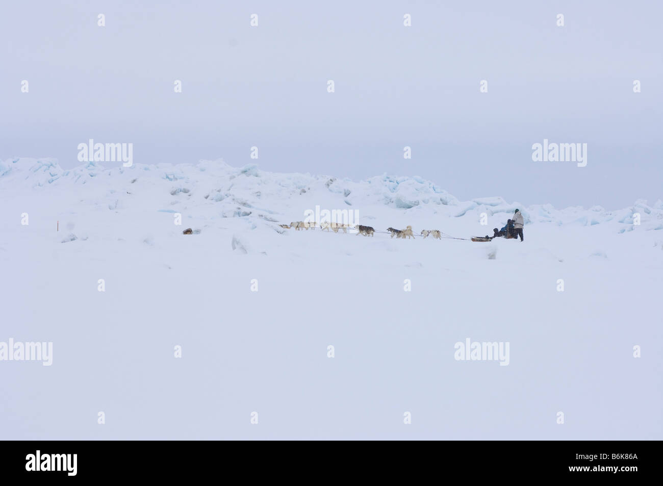 Inupiaq subsistence hunter reopens a hole in the pack ice for potential ...