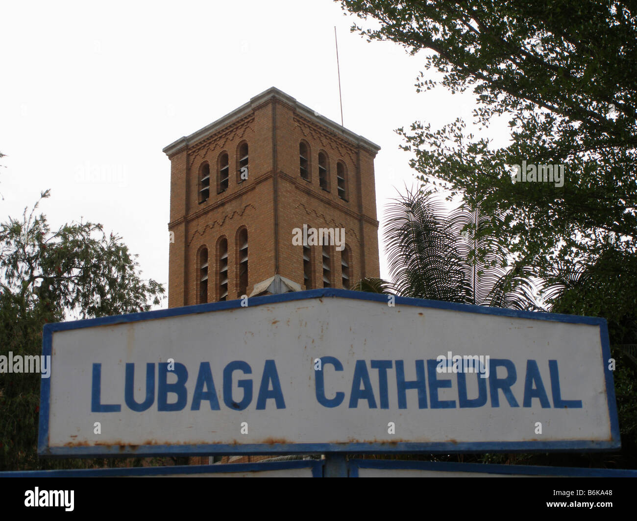 A sign for Lubaga (Rubaga) Cathedral with one of the Catholic cathedral ...