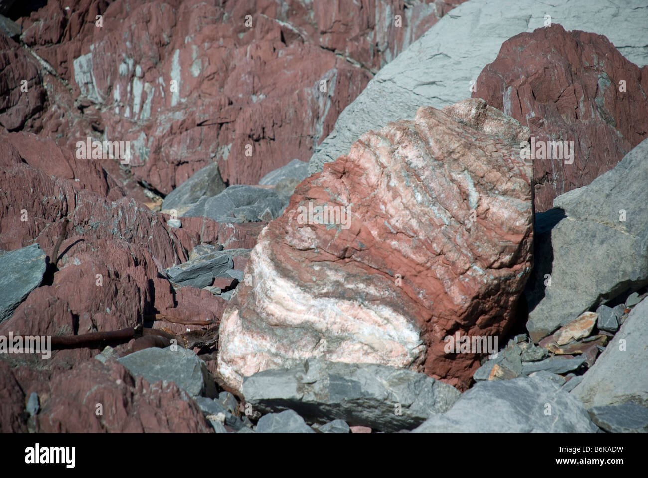 Red and stripy rocks in Wellington Stock Photo - Alamy