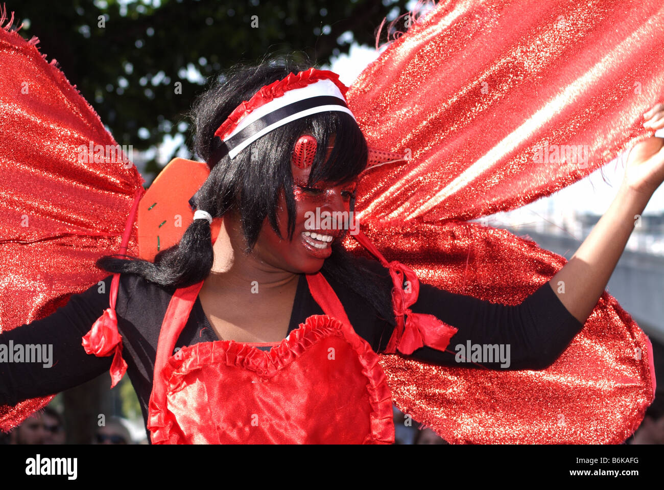 red devil mask caribbean style street artist theatre thames festival ...