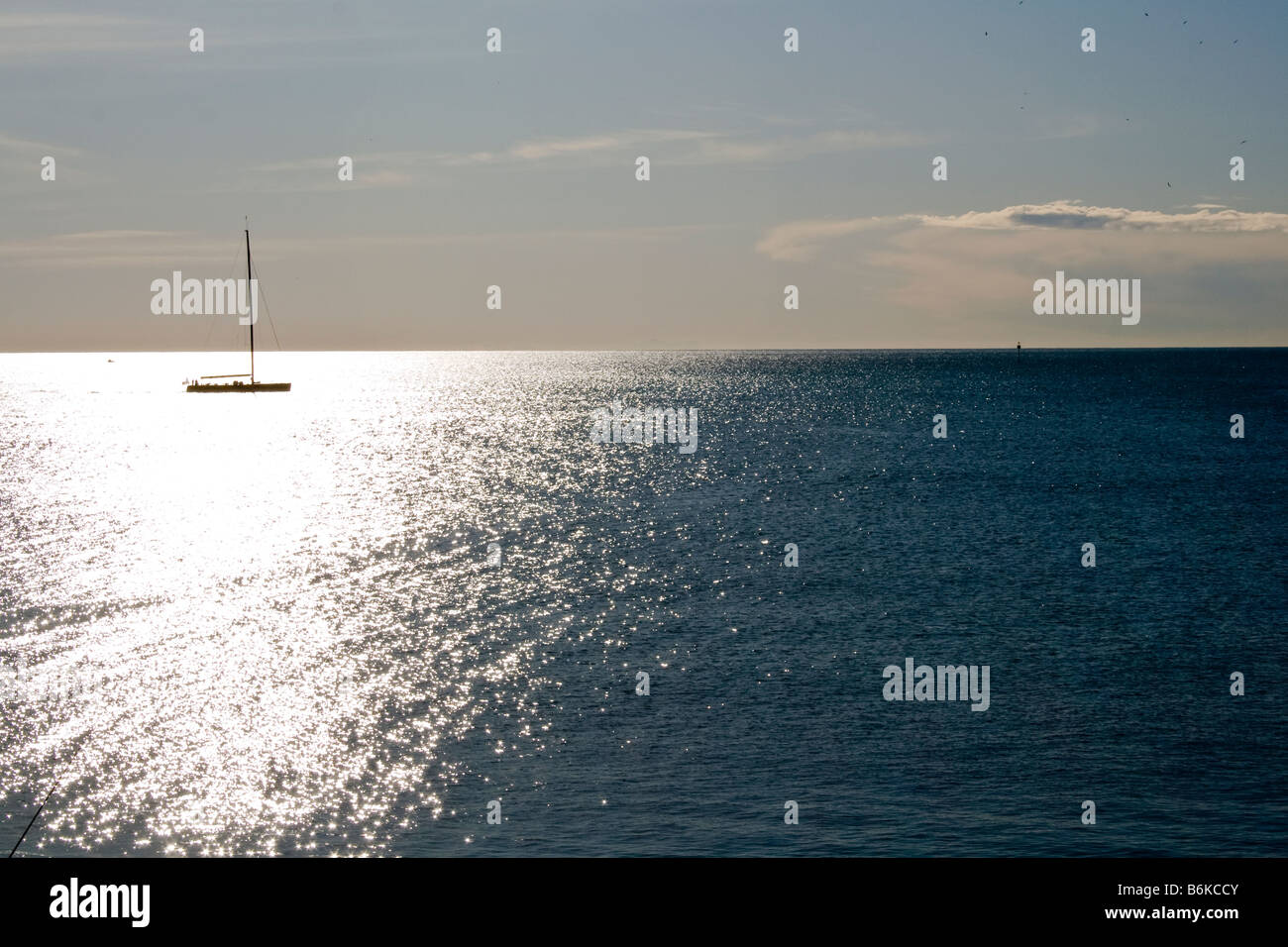 Lonely boat in sea Cut Out Stock Images & Pictures - Alamy