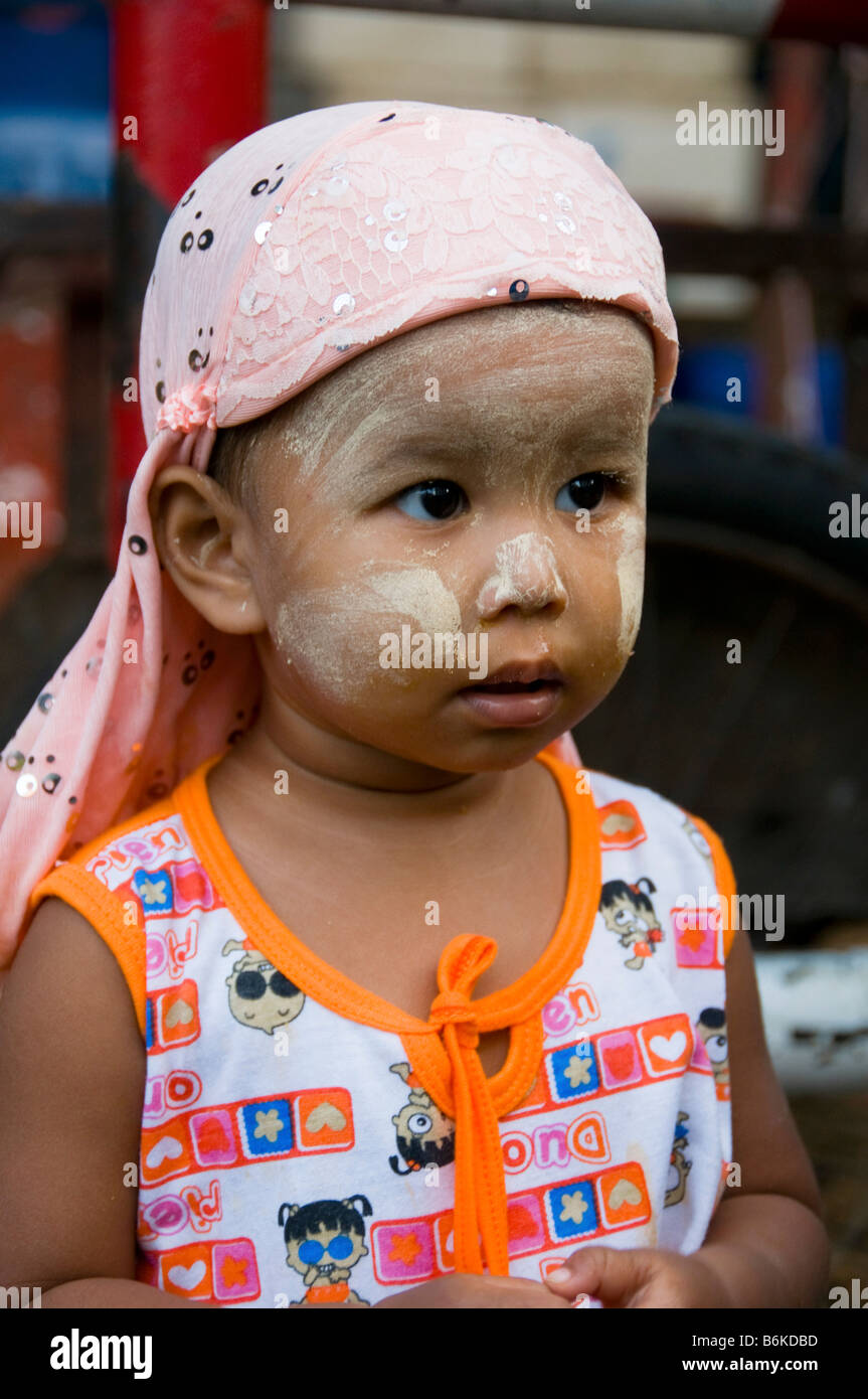 curious Burmese toddler with tanaka paste on his face in Mae Sot ...