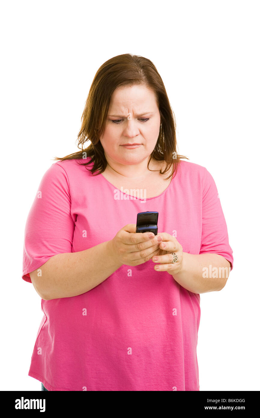 Woman texting angry Cut Out Stock Images & Pictures - Alamy