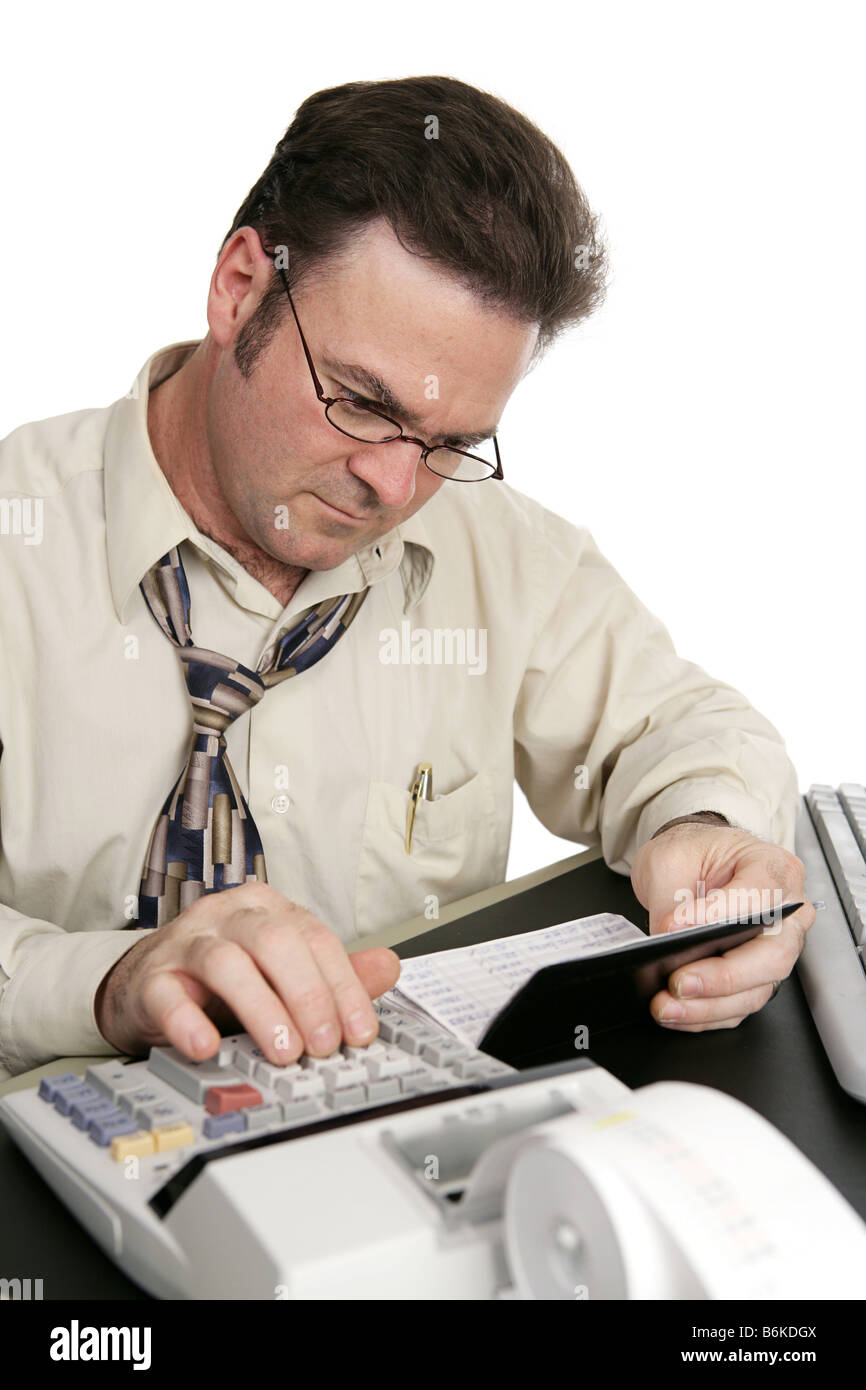 A man using a calculator to balance his checkbook Isolated on white ...