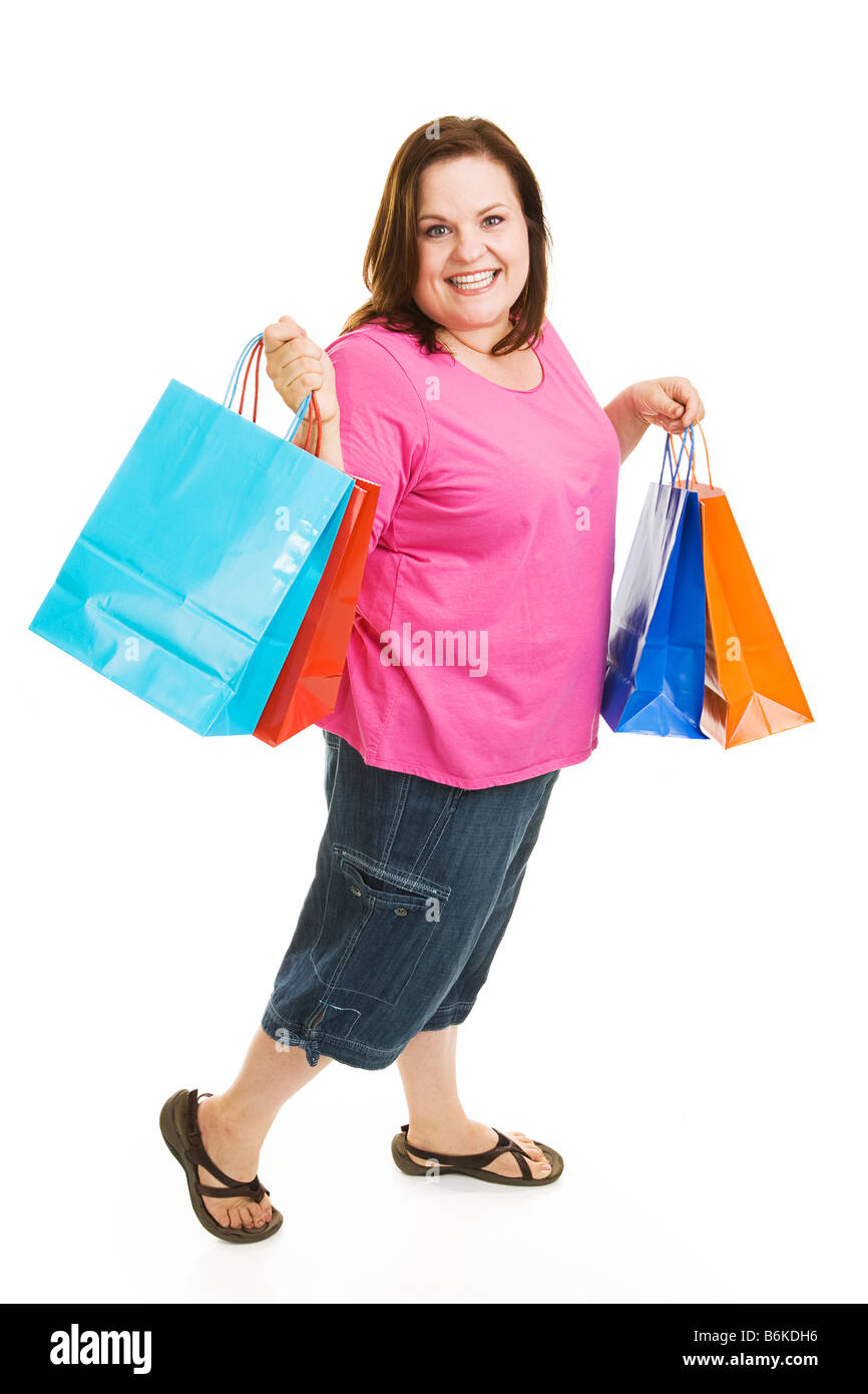 Pretty plus sized woman excited about bargain shopping Full body ...
