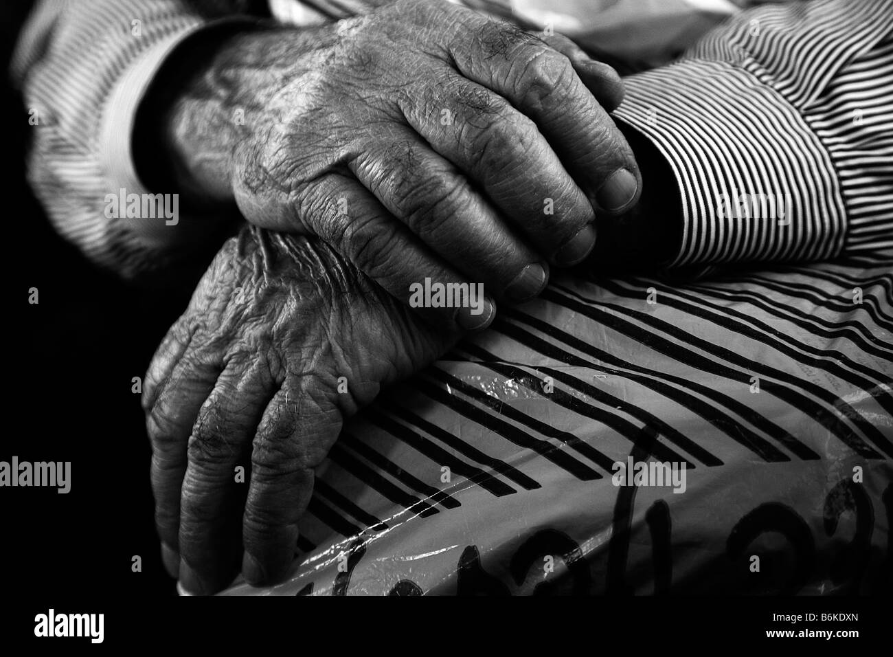Lone man in black Black and White Stock Photos & Images - Alamy