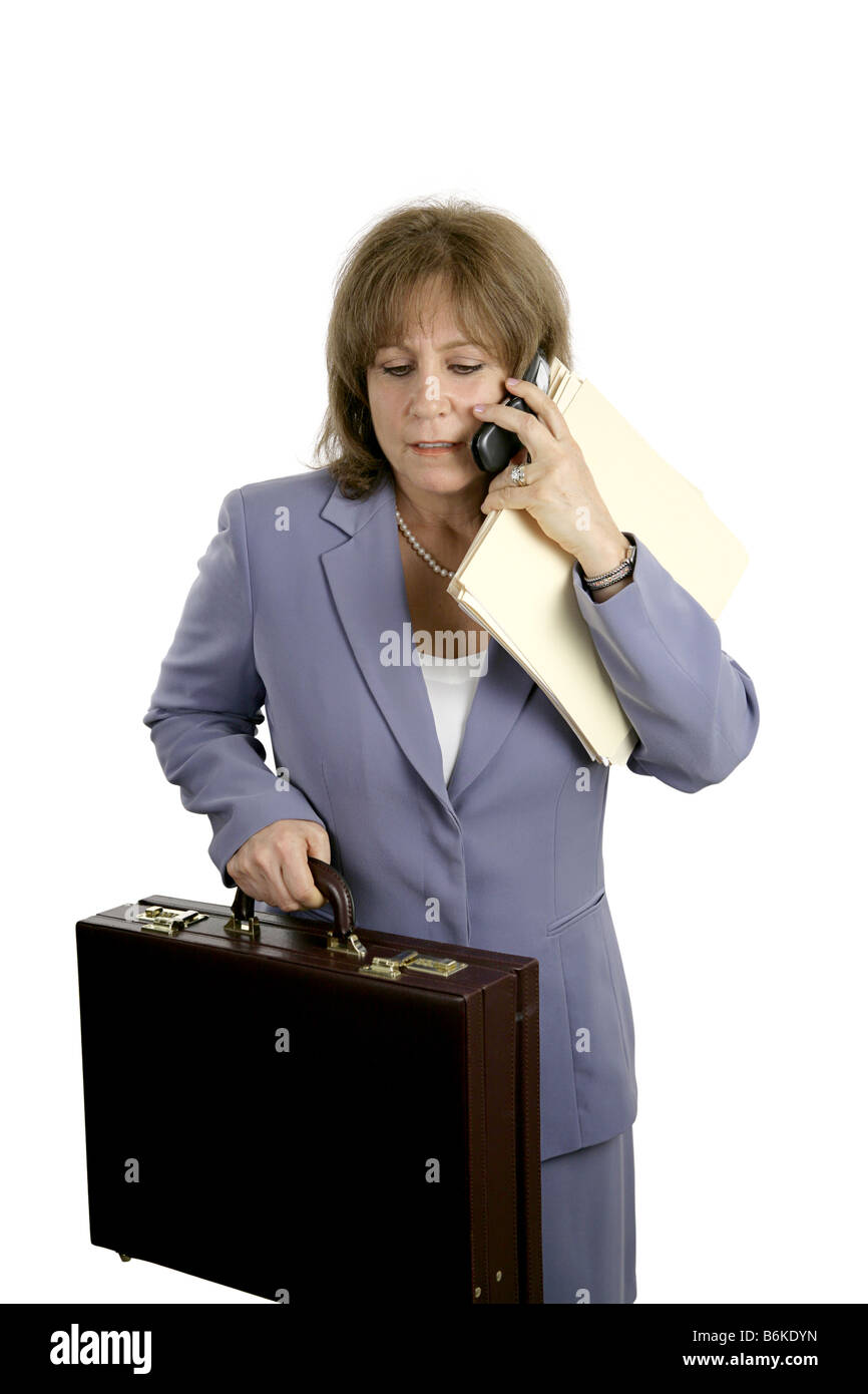 A businesswoman trying to do too many things at once She is stressed ...