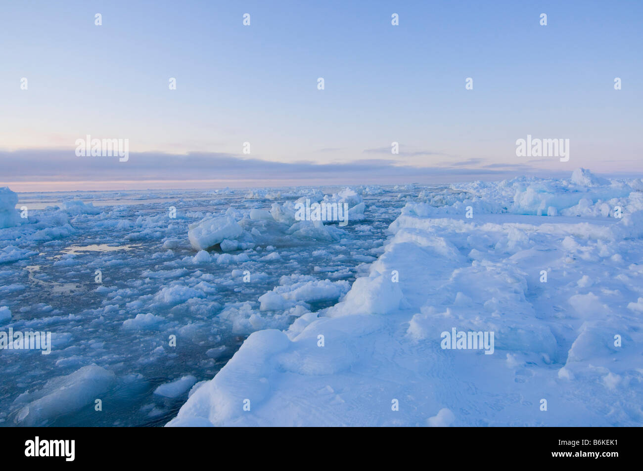 Polar seascape of ice flowing through an open lead in the pack ice ...