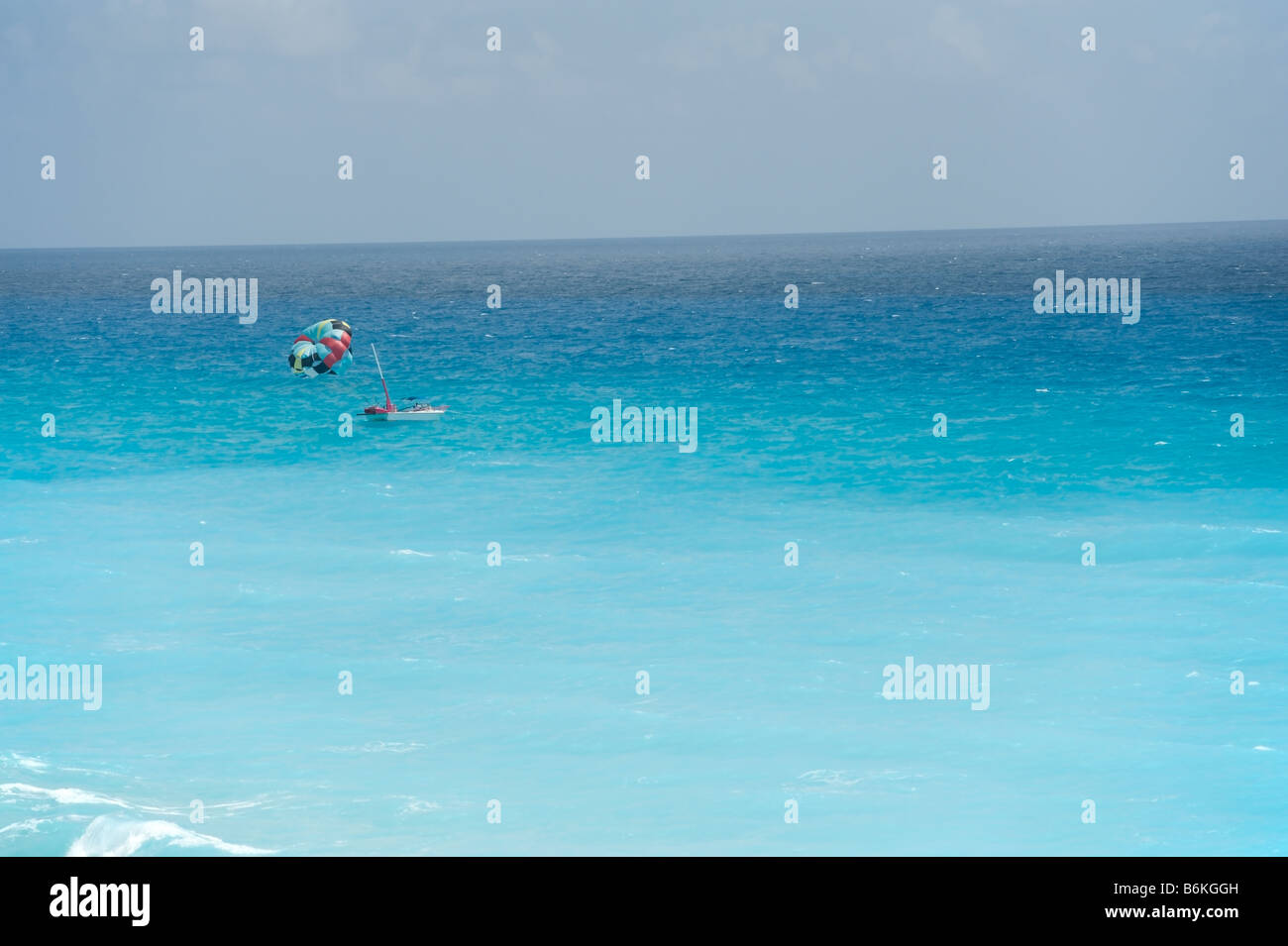 Parachute sailing in Cancun Mexico Stock Photo - Alamy
