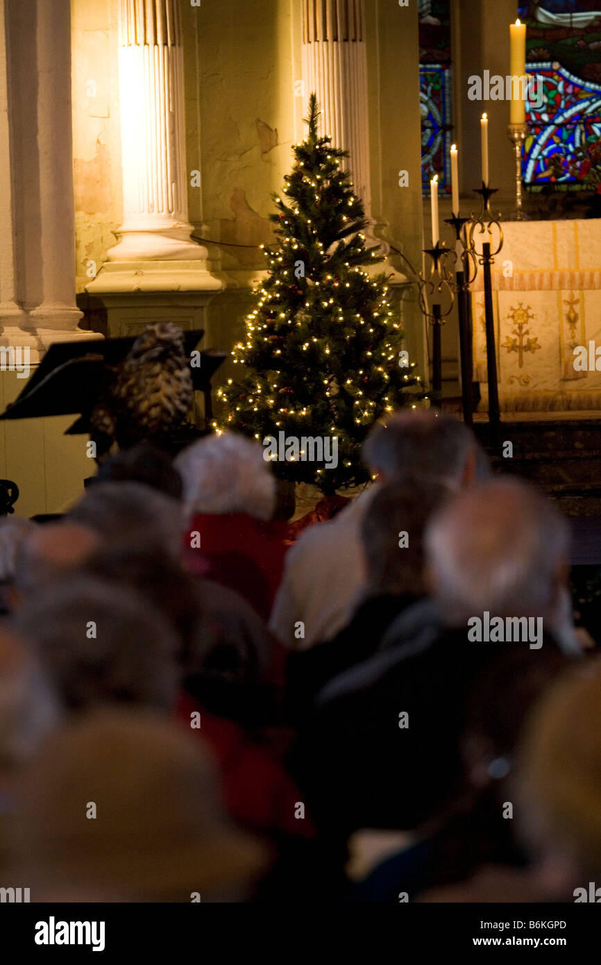 Christmas carol service hi-res stock photography and images - Alamy