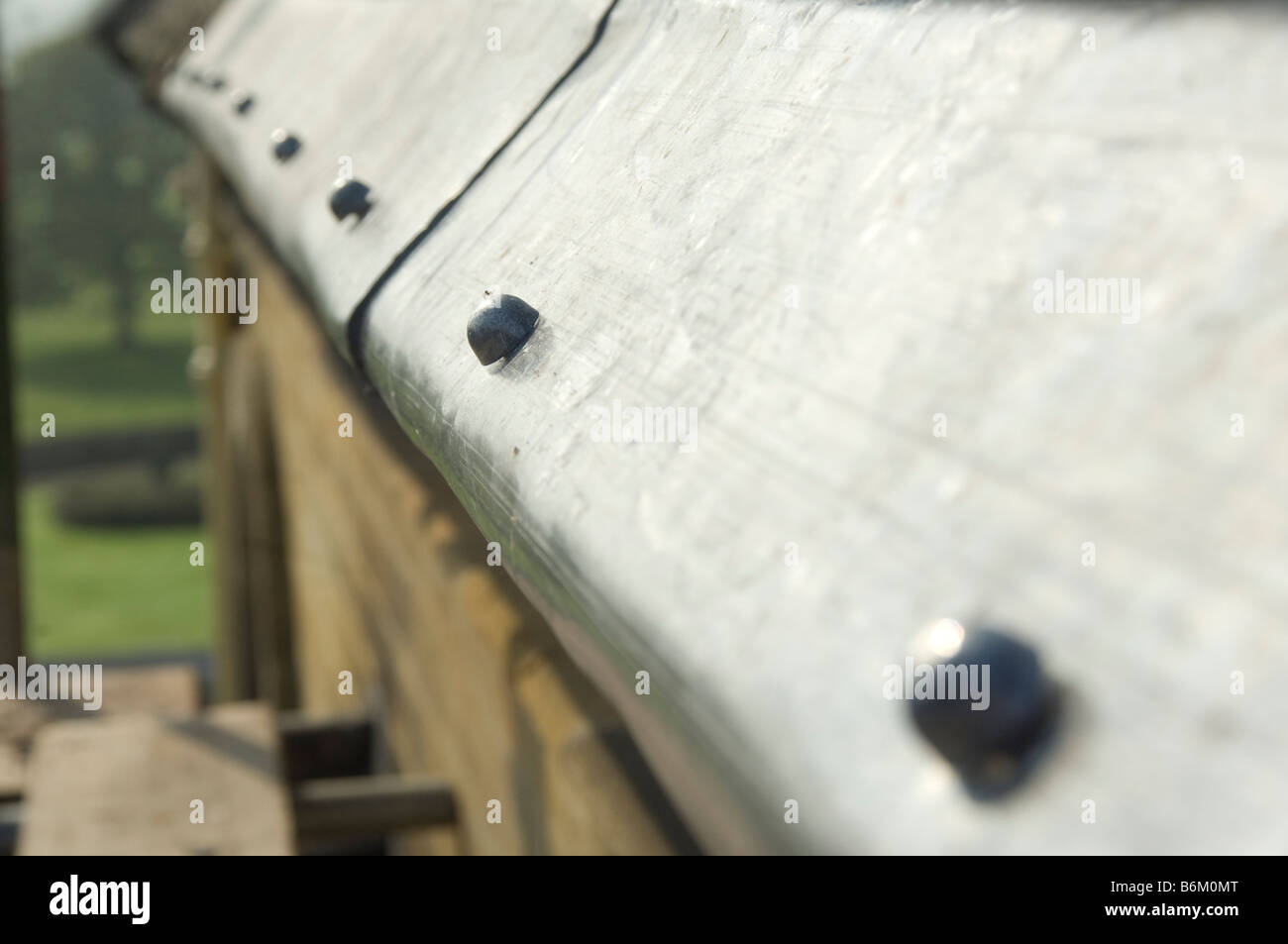 Rivets securing renewed lead sheeting on traditional roof Stock Photo ...