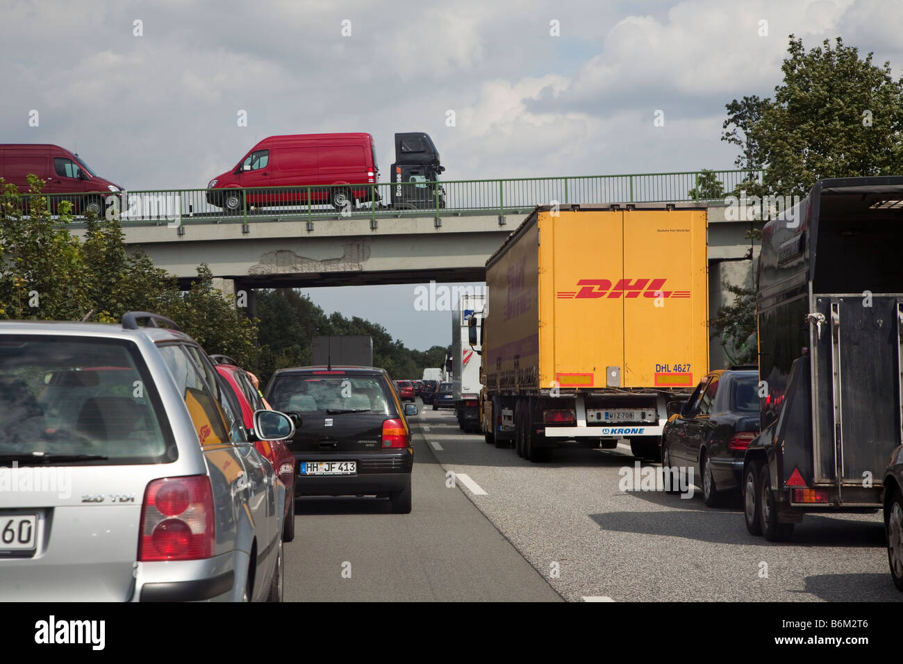 DHL van in heavy traffic jam on autobahn Germany Stock Photo - Alamy