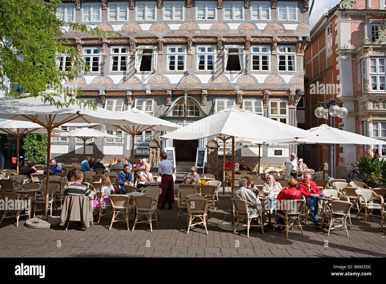 People at pavement bar tables outside the Stiftsherrenhaus or Capitular ...