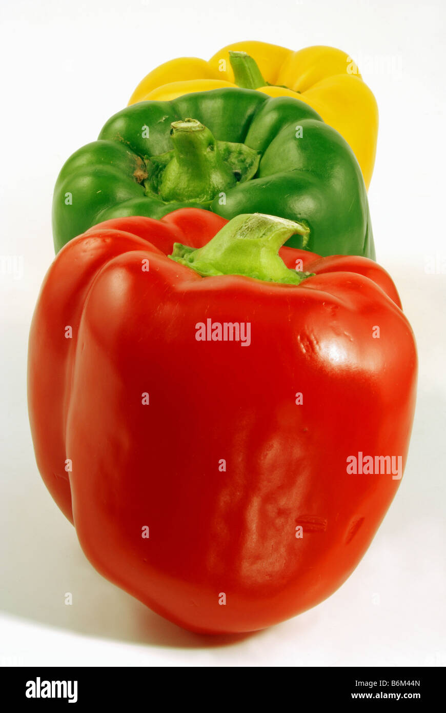 Colored paprika on a white background Stock Photo - Alamy