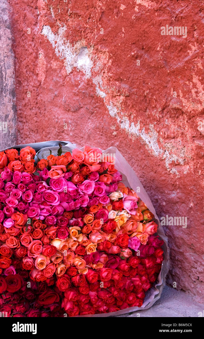 A Large Vendor S Bouquet Of Roses On A Sidewalk In San Miguel De