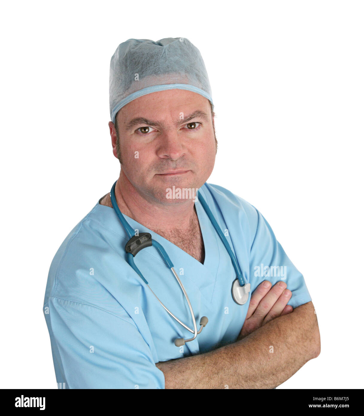 A handsome doctor in scrubs looking concerned Isolated Stock Photo - Alamy