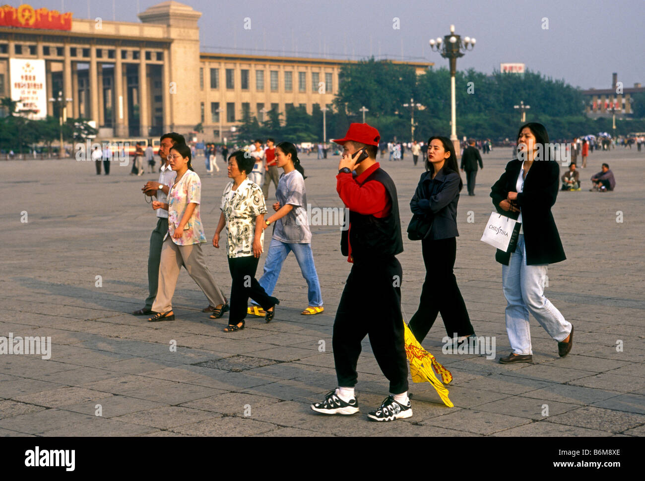 Chinese people, men and women, walking, stroliing, Tiananmen Square ...