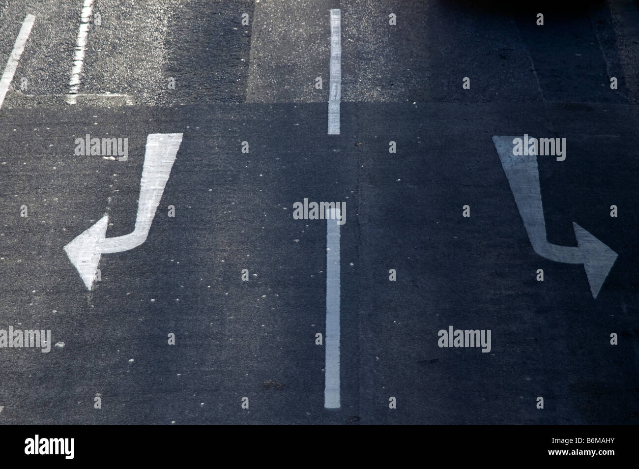 Arrows on a street in Edinburgh Stock Photo - Alamy