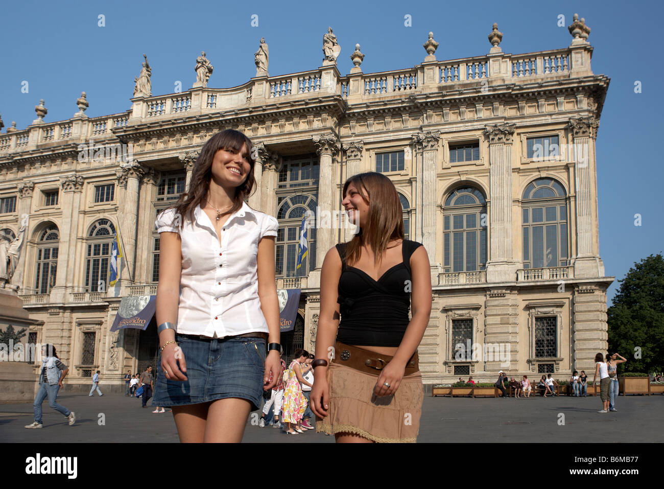 two young attractive women in front of Palazzo Madama. Turin, Italy ...