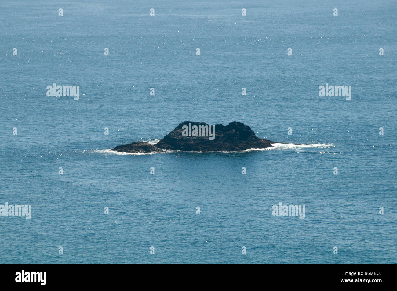 a rock island in the sea Stock Photo - Alamy