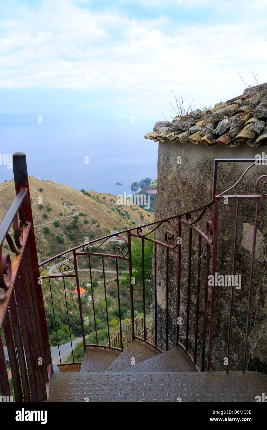 Spiral stairs down cliff in the Mountain Village of Castelmolo above ...