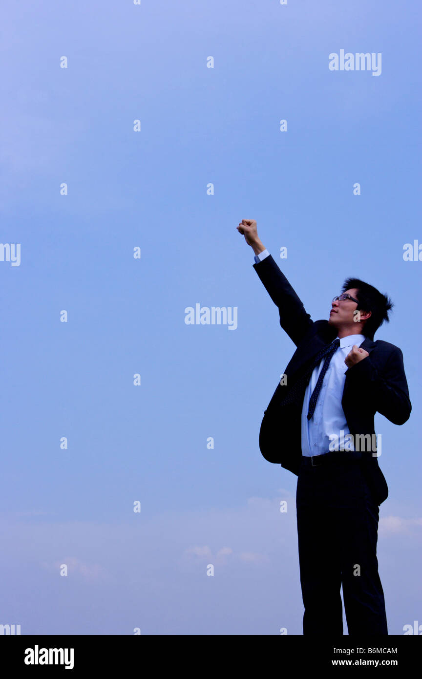 Businessman punching air hi-res stock photography and images - Alamy