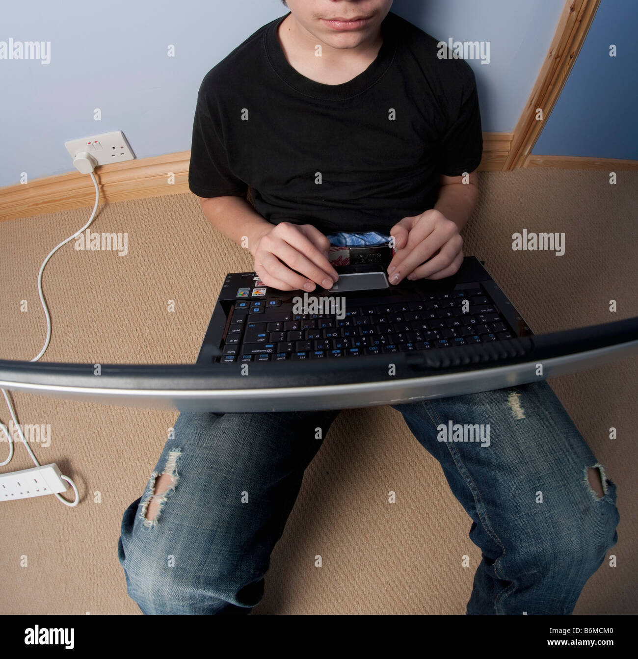 13 year old boy teenager with laptop computer Stock Photo - Alamy