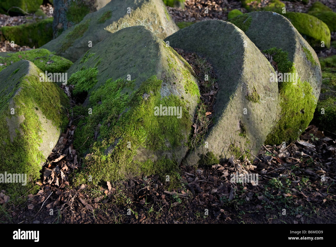 Hathersage. Carved, chiselled round, abandoned mill wheel, old, rural ...
