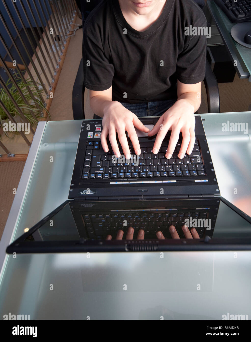 13 year old boy teenager with laptop computer Stock Photo - Alamy