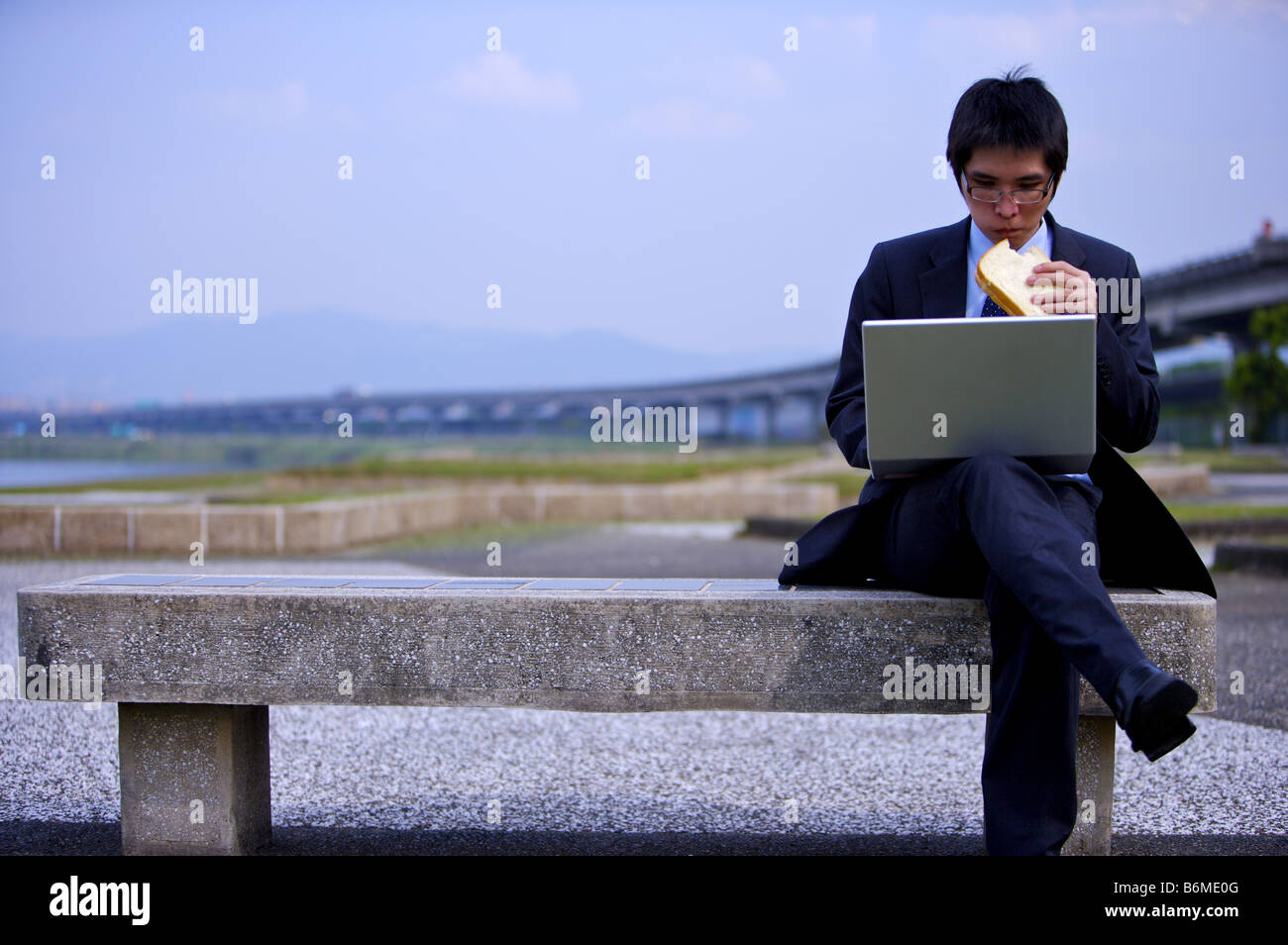 Businessman eating toast hi-res stock photography and images - Alamy