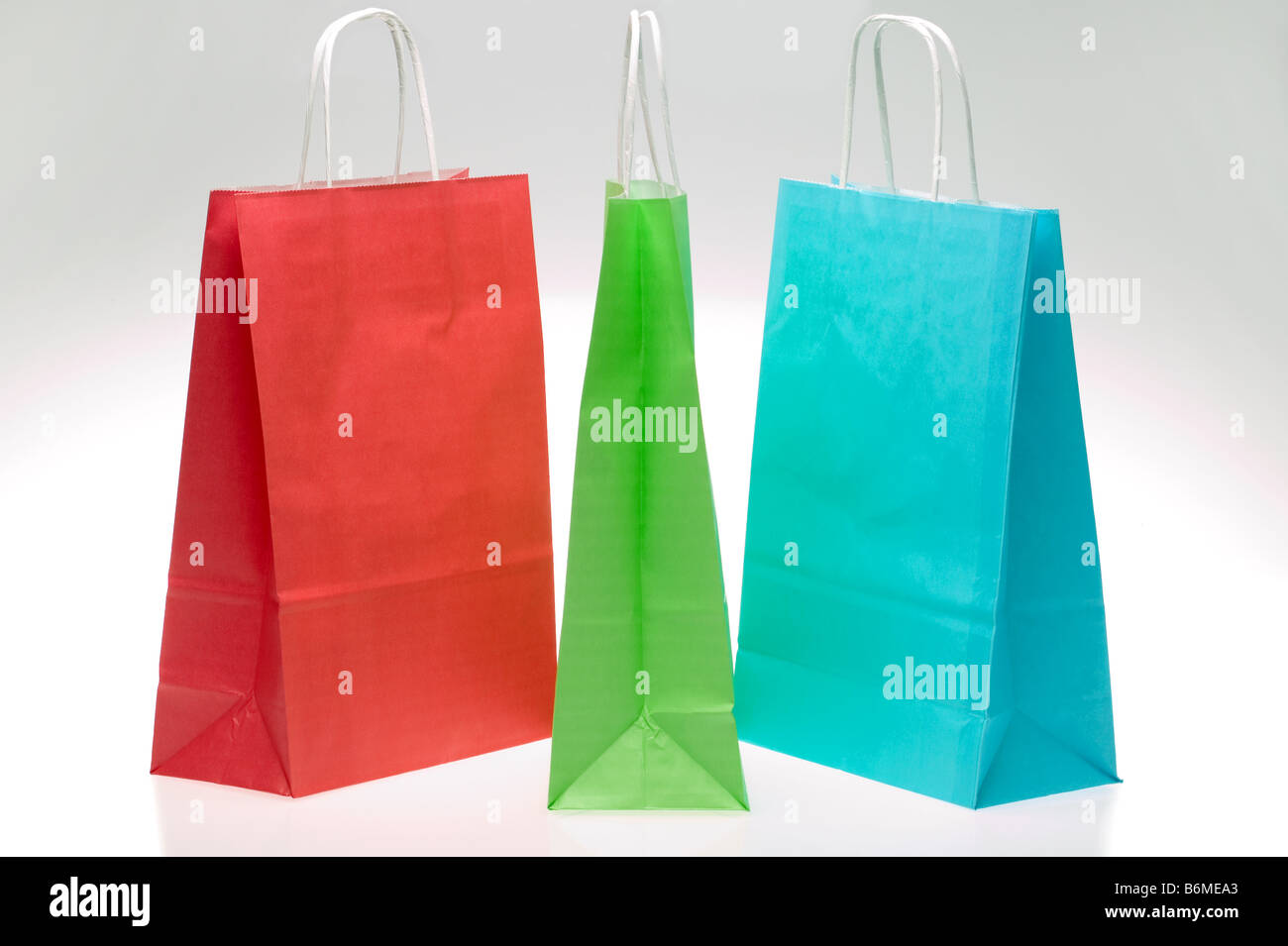 Red Green and Blue paper shopping bags Stock Photo - Alamy