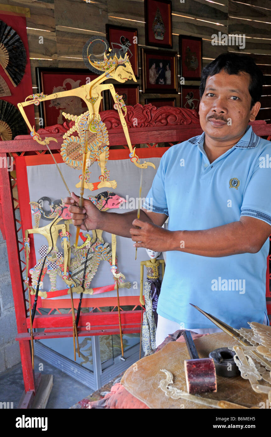 Javanese people holding a wayang kulit from Yogyakarta, Indonesia Stock ...